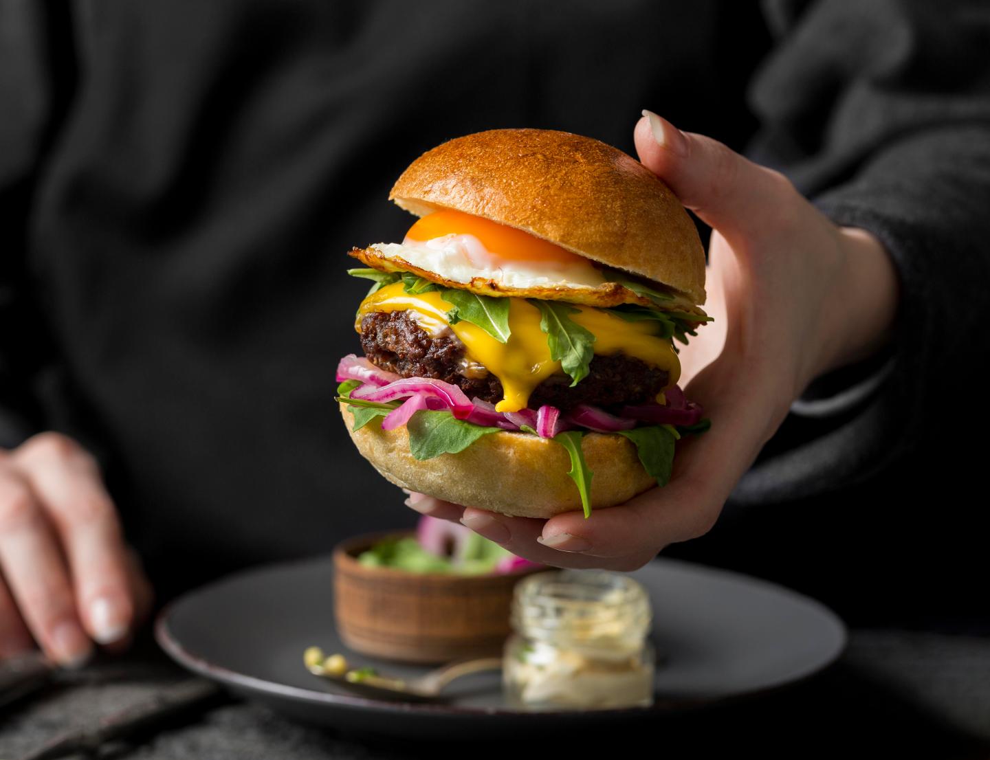 A restaurant specializing in premium handmade burgers with special in ...